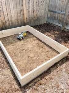 Simple DIY Sandbox With Slatted Roof - Sprucing Up Mamahood